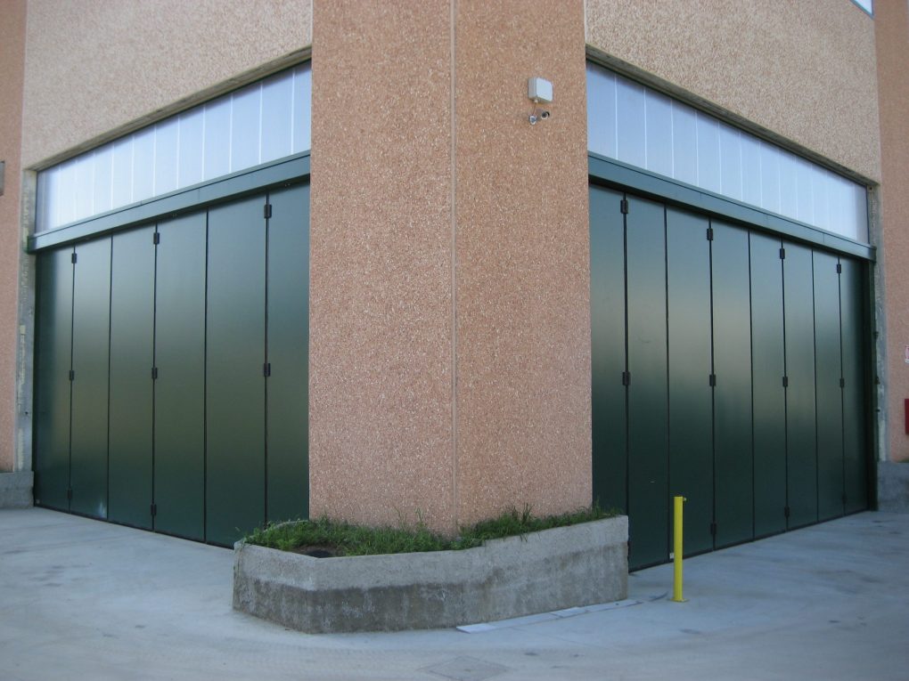 Lateral Side Folding Industrial Doors - Fors Srl